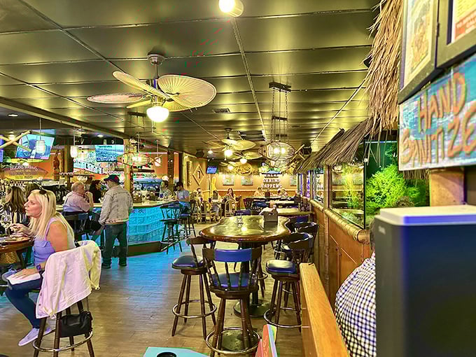 Where tiki meets tasty – the interior feels like a Jimmy Buffett song came to life and decided to serve incredible seafood.