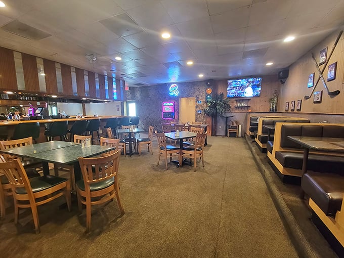 Classic diner aesthetics meet cozy comfort in this dining room where conversations flow as freely as the coffee.