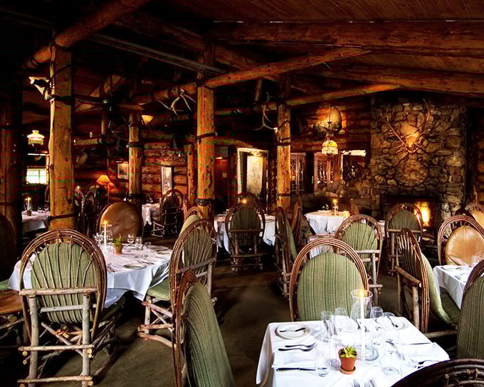 Stepping inside feels like entering a luxurious hunter's dream. Antlers and timber frame white tablecloths where culinary magic happens.