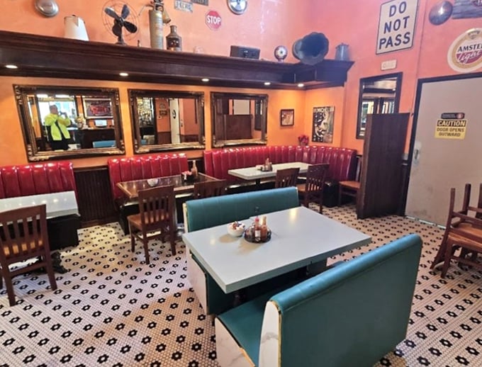 Step inside and you're transported to a diner wonderland—red vinyl booths, retro tiles, and the promise of comfort food ahead.