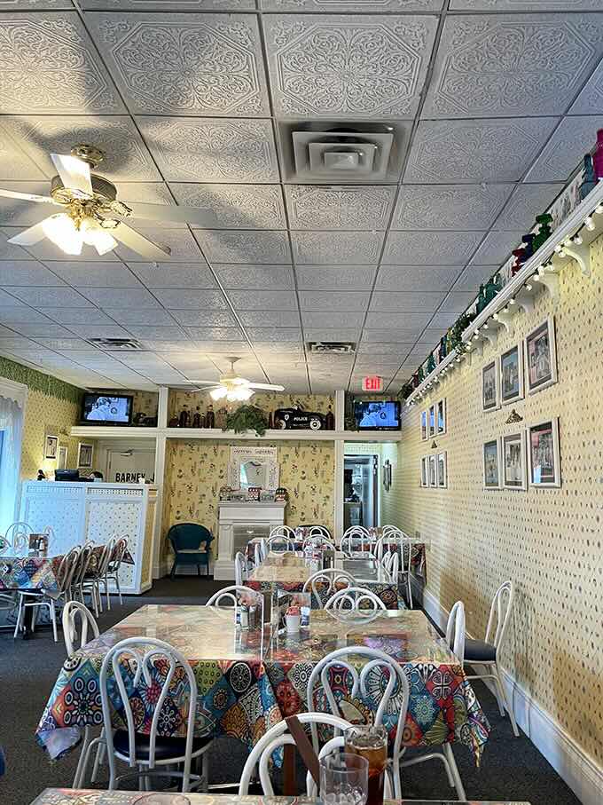 Step inside and you've time-traveled to a simpler era, where vintage wallpaper, classic memorabilia, and episodes of Andy Griffith create the perfect comfort food backdrop.