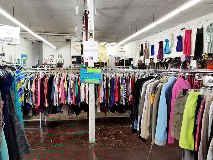 Racks upon colorful racks of clothing stretch across the floor like a fashion rainbow, each item with its own story to tell.
