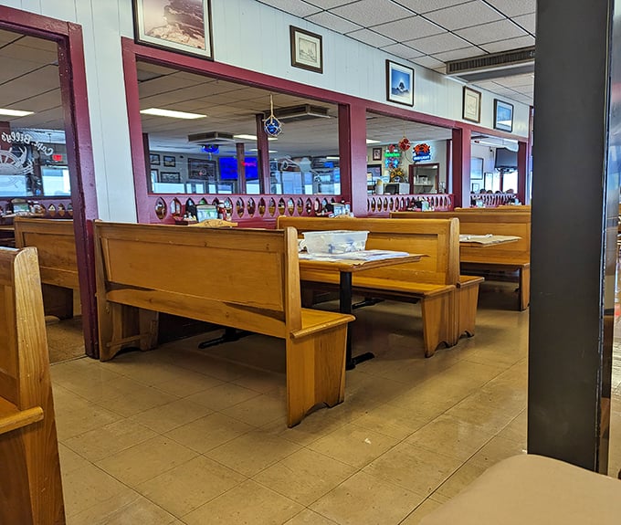 Wooden booths worn smooth by decades of crab feasts tell stories of countless memorable meals. This isn't fancy—it's authentic Maryland dining at its best.