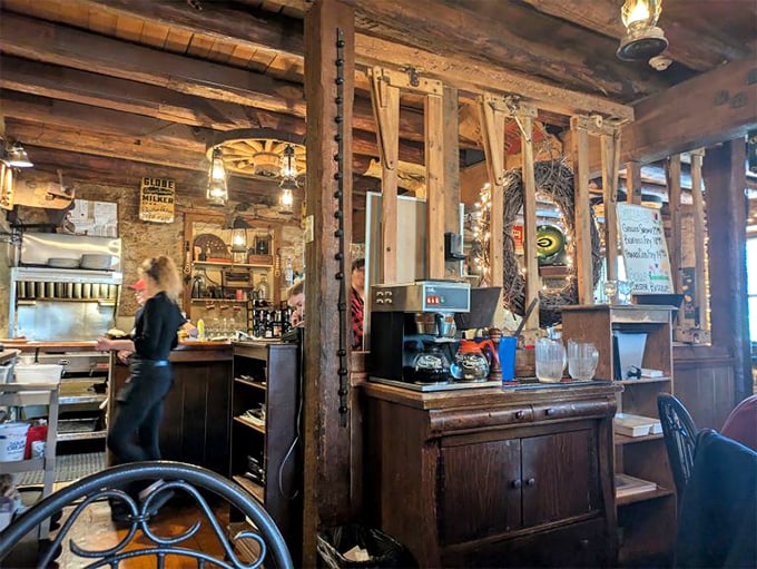 Exposed beams, stone walls, and vintage wood—this isn't interior design, it's a time machine to when restaurants prioritized character over concepts.