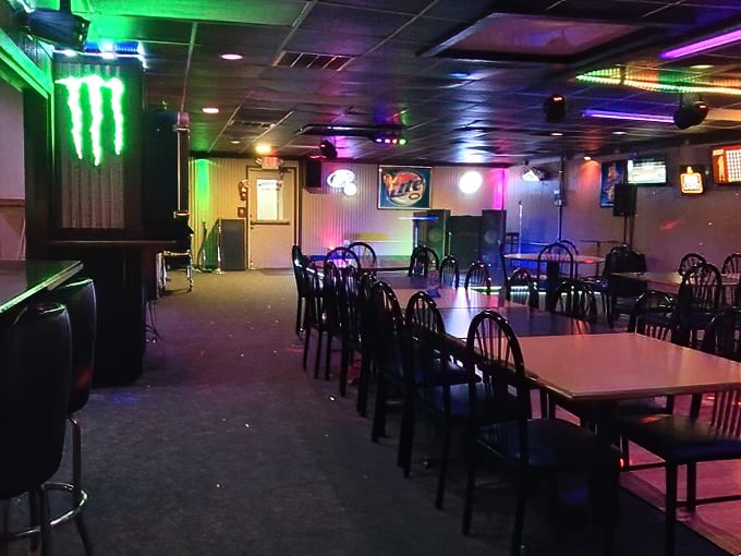 By night, this unassuming space transforms. Colorful lights and a stage area hint at The Backroom's double life as a neighborhood hangout.
