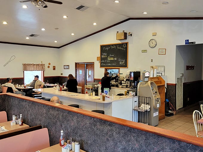 The classic diner counter at Mary's – where strangers become neighbors and calories don't count before noon.