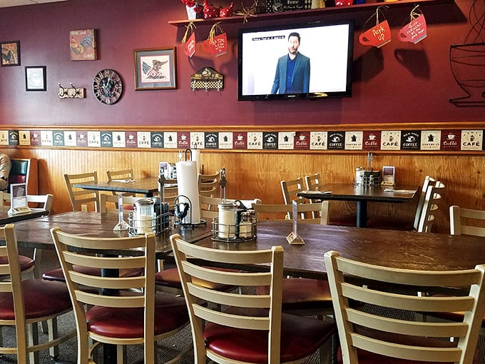 Inside, coffee-themed decor lines the walls while wooden tables invite lingering conversations. This isn't Instagram-bait design—it's authentic small-town charm.