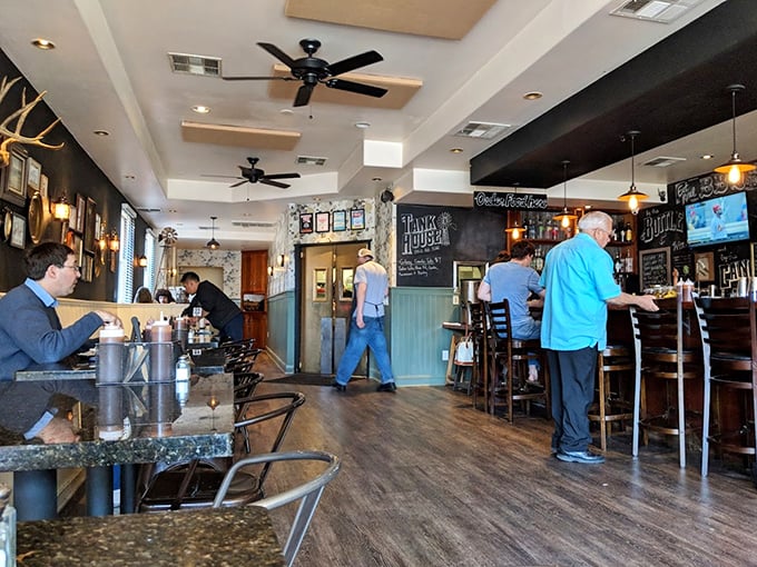 The interior strikes that perfect balance—cozy enough for conversation, spacious enough for the inevitable food coma that follows barbecue this good.