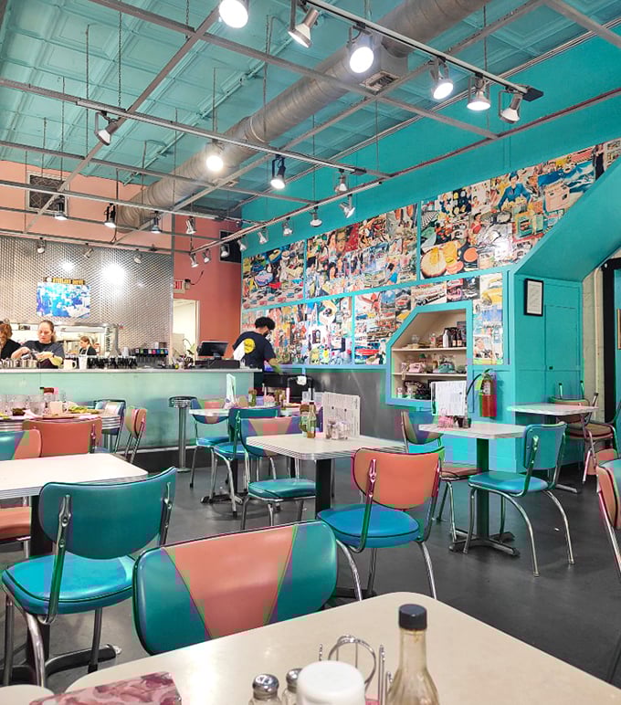 Turquoise ceilings, coral chairs, and walls plastered with memories—this isn't just retro design, it's a time machine with table service.