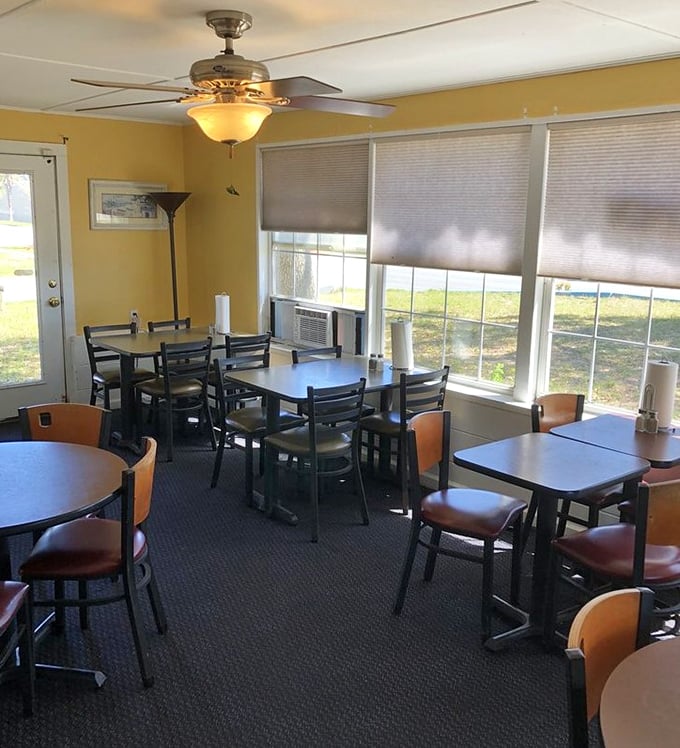 Sunshine yellow walls and simple furnishings tell you everything you need to know—they're spending their energy on the food, not fancy chairs. Smart priorities.