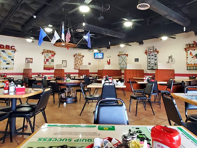Inside Dixie Belle's, handmade quilts adorn walls while ceiling fans lazily spin above tables where breakfast dreams come true. Norman Rockwell would feel right at home.