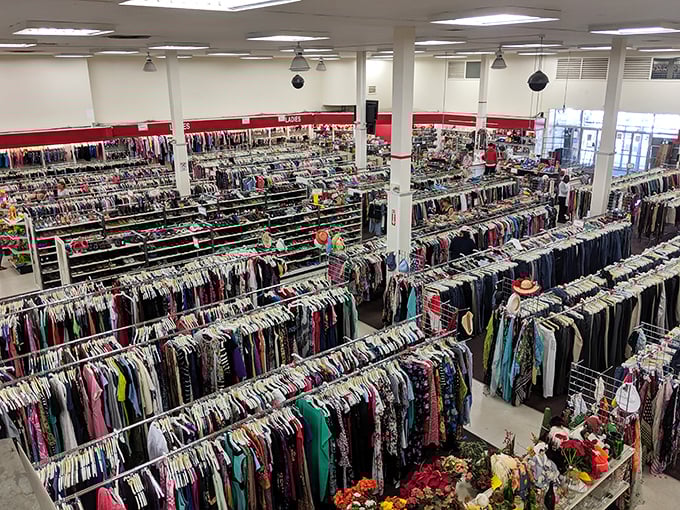 A textile Nebraska stretches before you—rack after colorful rack of possibilities, each one a story waiting to be continued.