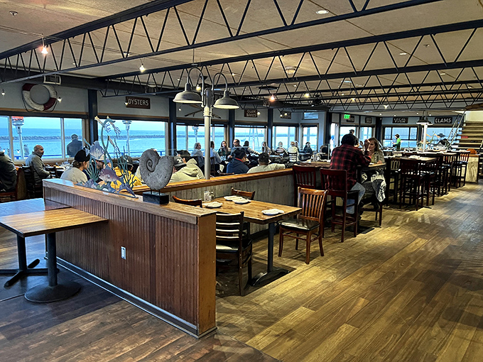 Ocean views that could make a seagull jealous frame the dining experience, where every table feels like the captain's table.