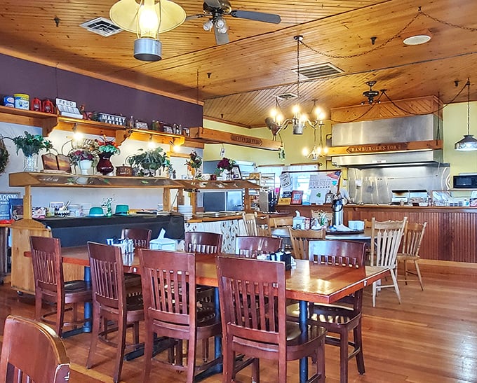 Warm pine ceilings, wooden tables, and country charm create the perfect backdrop for morning conversations. It's like dining in your favorite aunt's kitchen—if she could cook for 50.