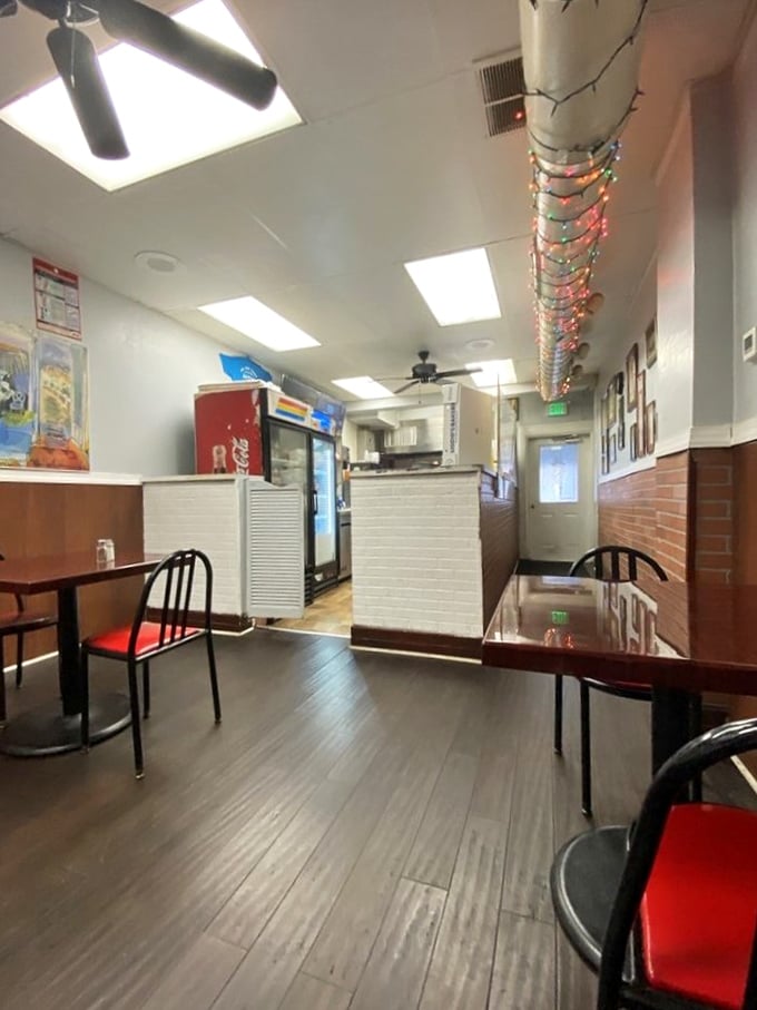 Christmas lights twinkle year-round above simple tables. In the sandwich world, the red carpet treatment isn't about fancy chairs—it's about what lands on your plate.