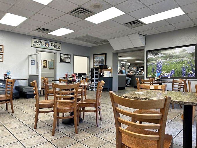 Simple wooden chairs and tiled floors set the stage for extraordinary comfort food. No pretension here—just honest cooking and Texas hospitality.