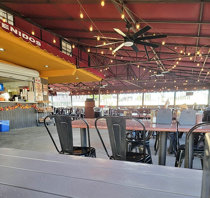 String lights create magic while metal chairs promise comfort – sometimes simplicity delivers the greatest rewards.