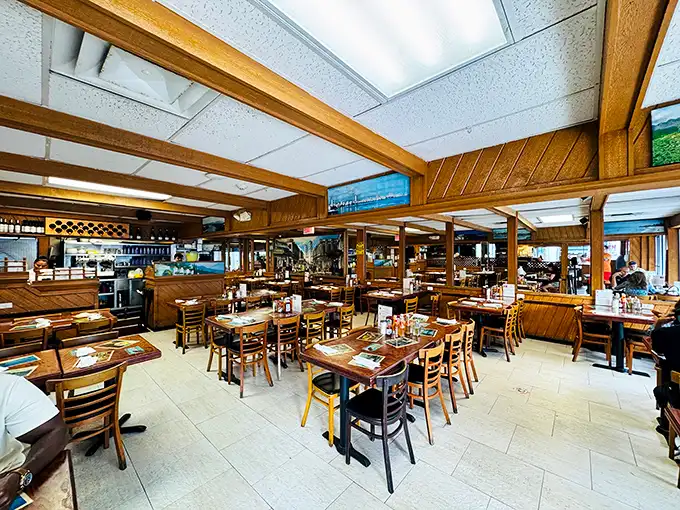 Wood-paneled walls and no-nonsense tables create the perfect backdrop for culinary magic—like finding Havana in a time capsule.