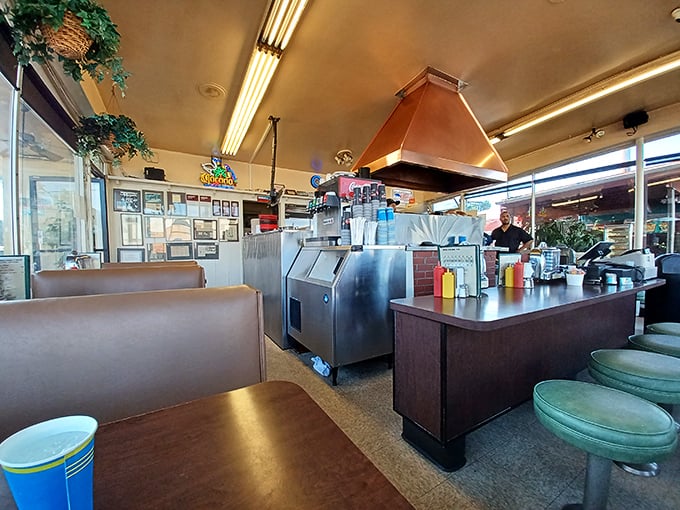 The counter seats aren't just the best spots in the house—they're front-row tickets to a culinary performance that's been running since Eisenhower was in office.
