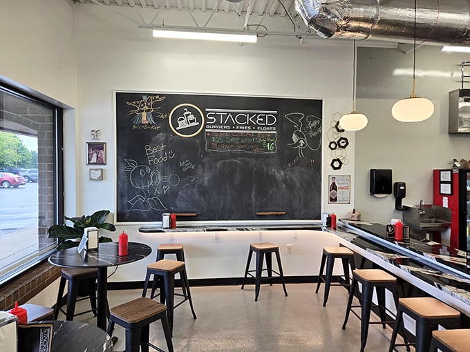 Modern industrial meets cozy neighborhood joint – where great burgers deserve great atmosphere.