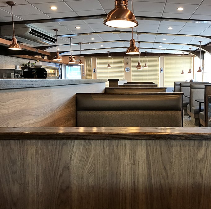 Slide into these comfortable booths where important decisions await – like whether to order the pancakes, French toast, or throw caution to the wind and get both.