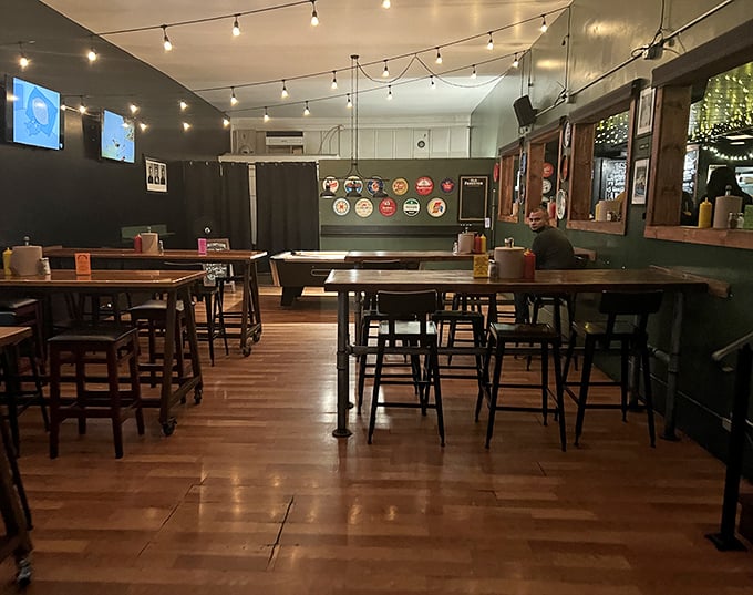 String lights and wooden tables create that perfect "neighborhood joint" vibe where everybody might not know your name yet, but they'll remember your order.