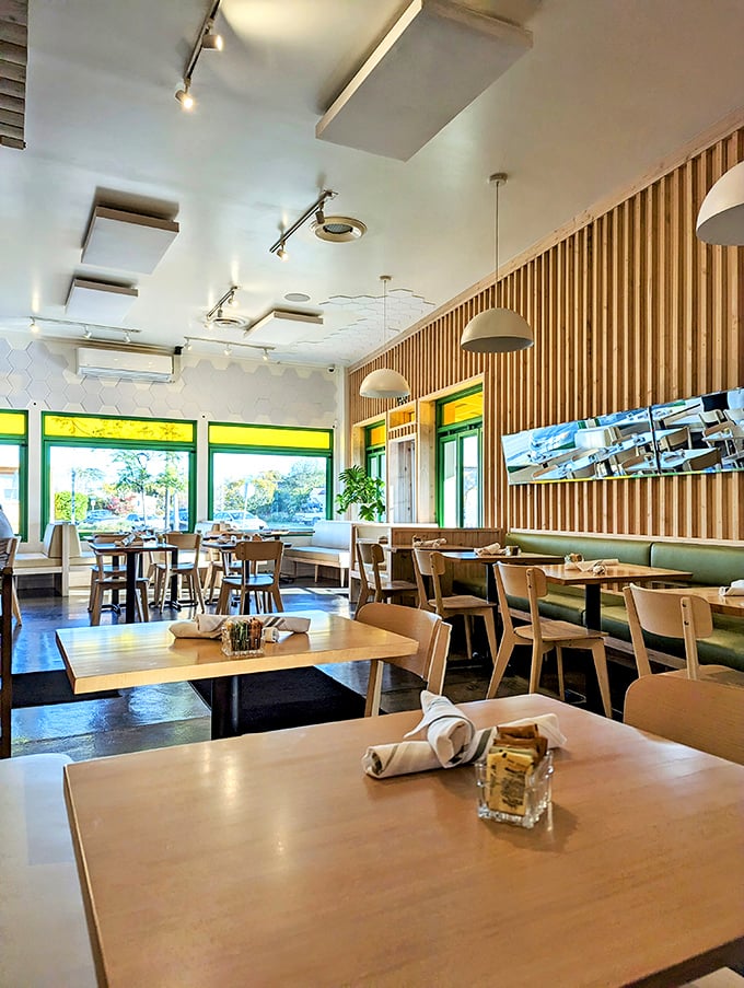 Light wood, honeycomb tiles, and slat walls create that rare space that's both Instagram-worthy and comfortable enough to linger over a third coffee.