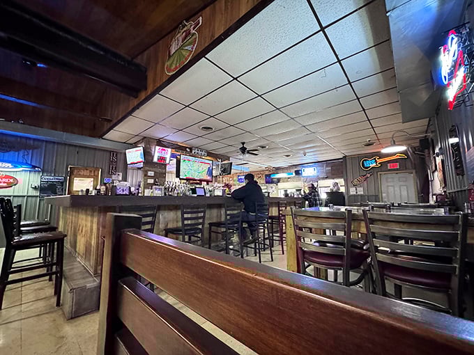 Inside Spoonies, wood paneling and neon signs create that perfect small-town bar atmosphere where everybody might not know your name yet, but they soon will.