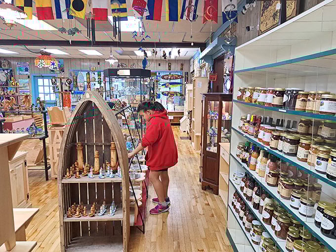 Inside, colorful Pennsylvania Dutch flags hang from the ceiling while shelves overflow with local treats and handcrafted treasures.