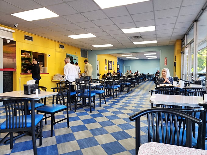 Checkered floors and sunny walls create the perfect backdrop for serious breakfast business.
