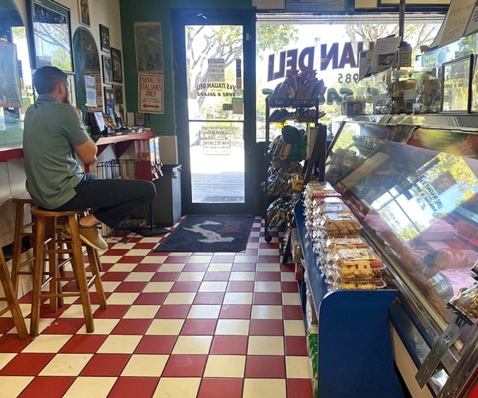 The classic red and white checkered floor isn't retro by design—it's authentic by longevity, setting the stage for sandwich artistry that transcends time.