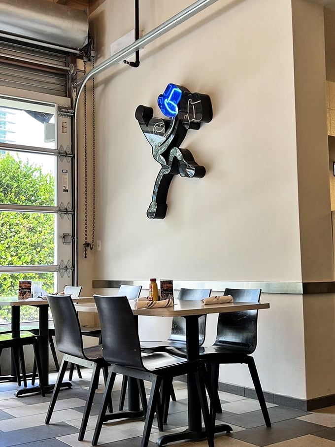 That top hat wall art isn't just decoration—it's a promise of the elevated deli experience that awaits. Clever design meets comfort food paradise.