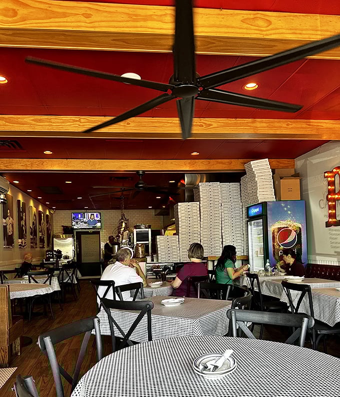The classic black ceiling fans and warm wooden beams create that "where everybody knows your name" vibe. Comfort begins before the food even arrives.