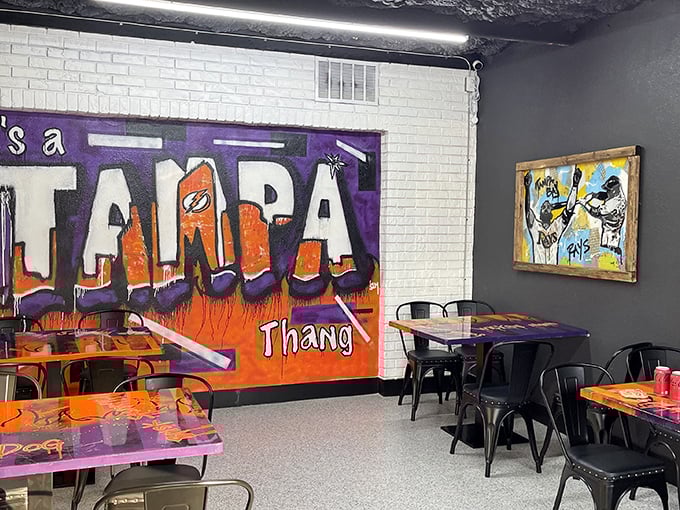 "It's a Tampa Thang" isn't just wall art—it's a mission statement. The graffiti-style murals and industrial vibe create barbecue's perfect urban playground.