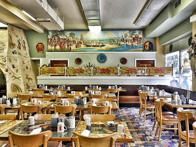 Step inside and you're greeted by a feast for the eyes—historical murals, wooden tables, and the unmistakable buzz of happy diners plotting their pancake strategy.
