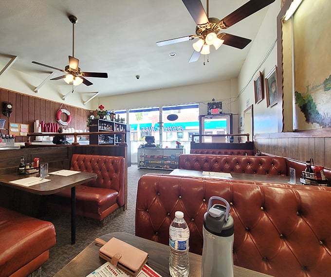 Those red vinyl booths have witnessed more perfect fish and chips moments than any furniture deserves.