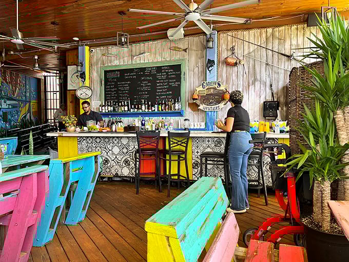 Where tropical colors meet maritime charm. Garcia's bar area feels like the galley of the coolest fishing boat that decided to drop anchor permanently.