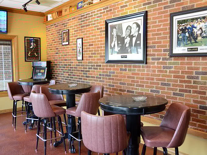 Classic brick walls adorned with memorabilia create that perfect Wisconsin supper club ambiance—where conversations flow as smoothly as the cocktails.