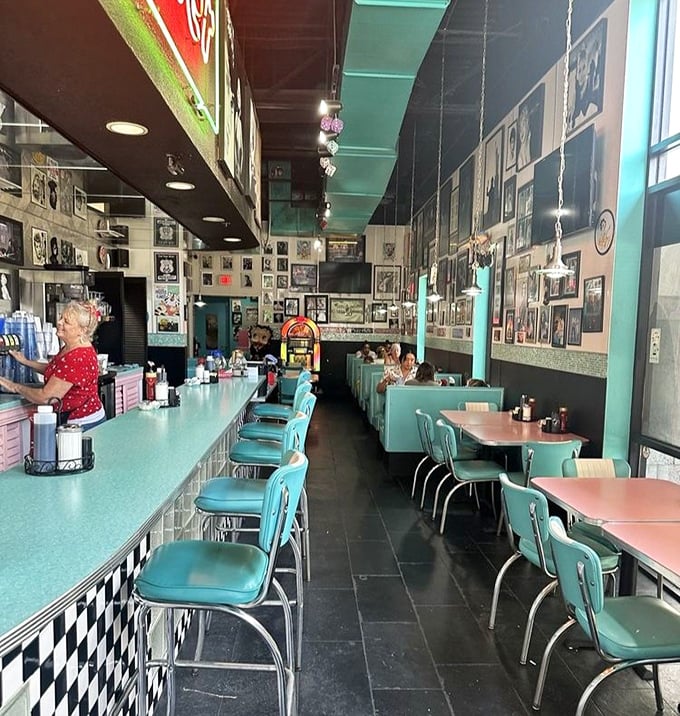 Step inside and time-travel to the golden age of diners—turquoise booths, checkered counters, and walls plastered with memories of simpler times.