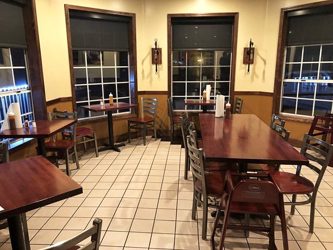 Simple wooden tables and clean tile floors let you focus on what matters most – the smoky masterpieces about to arrive.