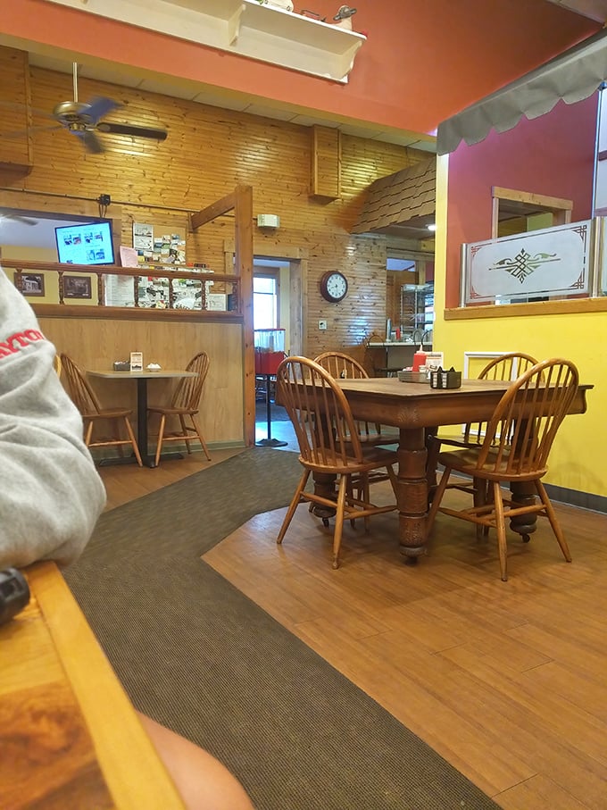 Warm wood paneling and splashes of cheerful color create that rare atmosphere where calories don't count and conversations flow as freely as the coffee.