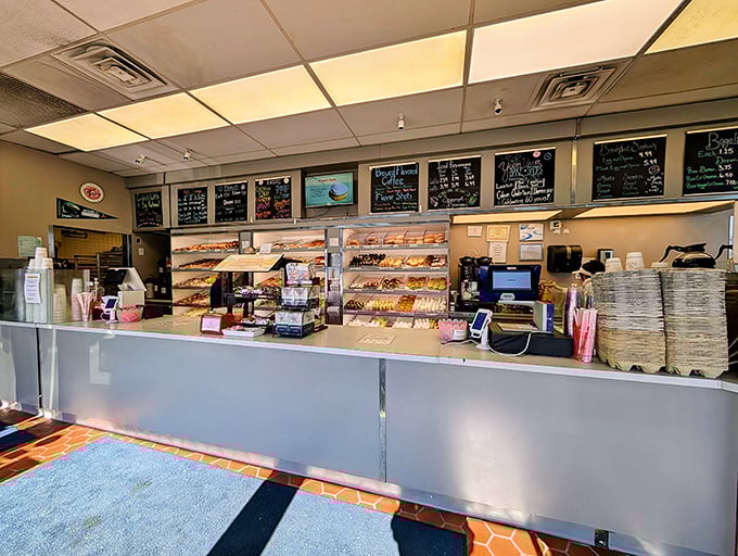 The counter at Yum Yum is like the gates of heaven, if heaven smelled like fresh donuts and brewed coffee.