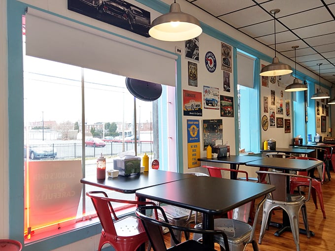 Retro metal chairs and vintage road signs create the perfect backdrop for burger bliss—nostalgia you can actually taste.