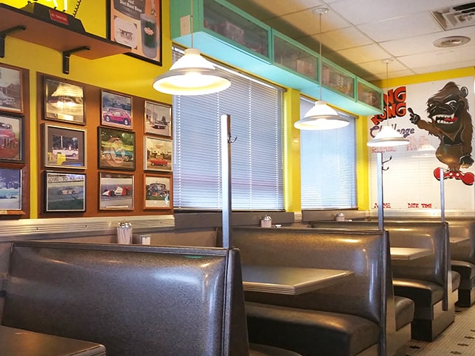 Silver booths that have cradled generations of hungry patrons, beneath walls that chronicle America's love affair with chrome and horsepower.