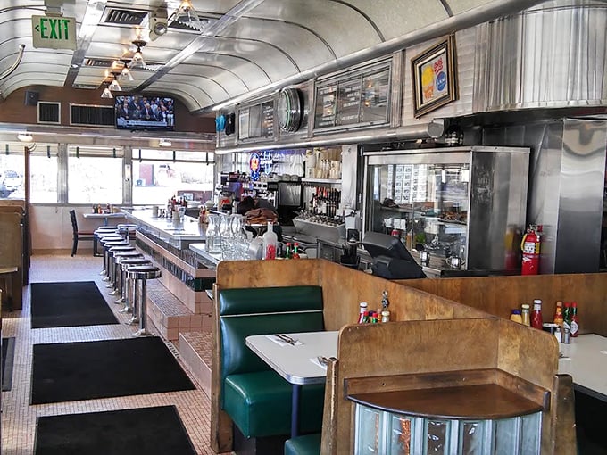Chrome, vinyl, and nostalgia – the holy trinity of diner design creates a space where conversations flow as smoothly as the coffee.