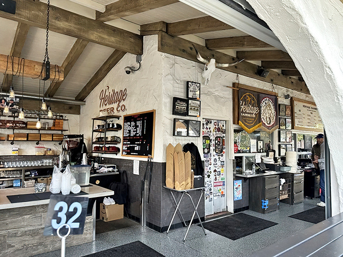 Inside, rustic wooden beams frame a temple of Texas-style barbecue transplanted to California soil. Order number 32 is about to experience meat nirvana.