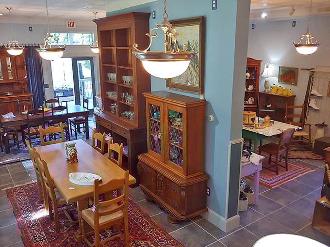Warm wood tones and carefully arranged furniture create intimate vignettes throughout the shop. Each corner tells a different story waiting to be discovered.