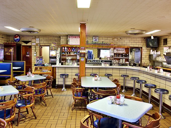 Step inside and time stands still – counter seating with swivel stools, cozy booths, and that unmistakable warm glow that only comes from decades of good meals.
