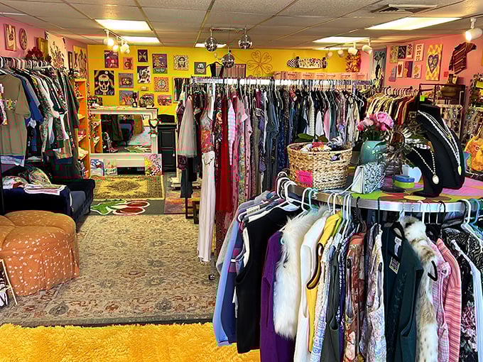 Racks upon racks of carefully curated clothing create a vintage rainbow. The thrill of the hunt begins here.