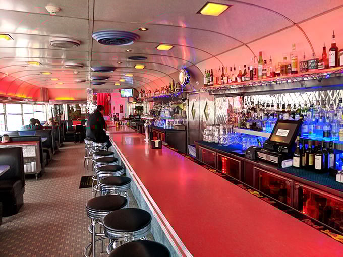 The bar at Silk City isn't just serving drinks—it's serving time travel with a side of local spirits and conversation that flows as smoothly as their cocktails.